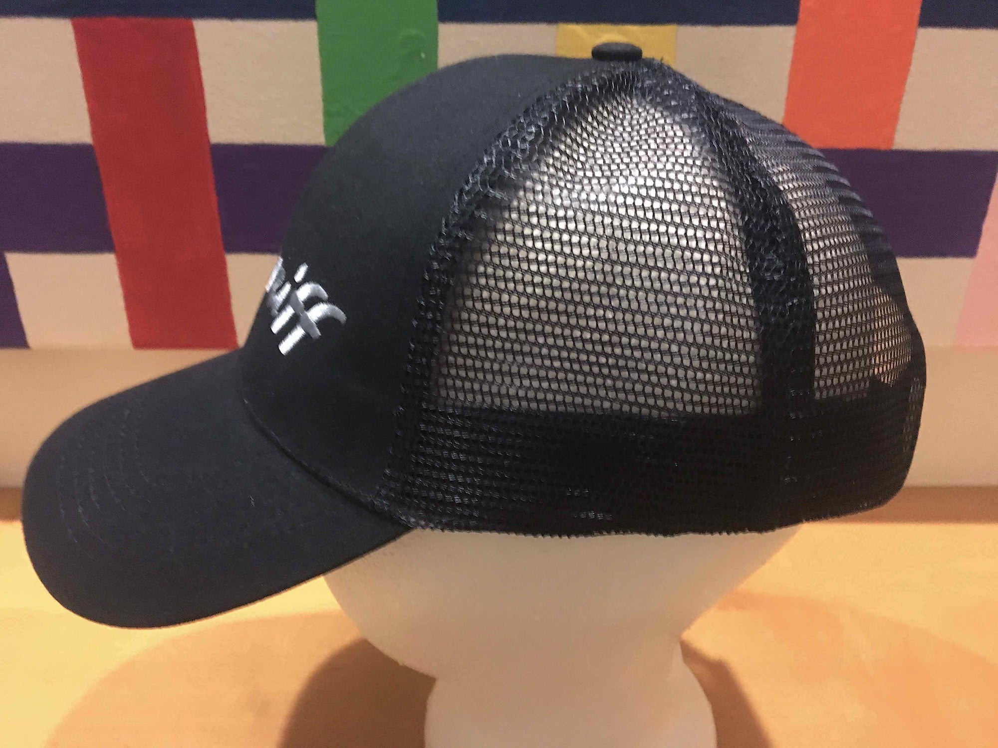 Get Noticed with our Navy Mesh Baseball Cap - Braniff Boutique